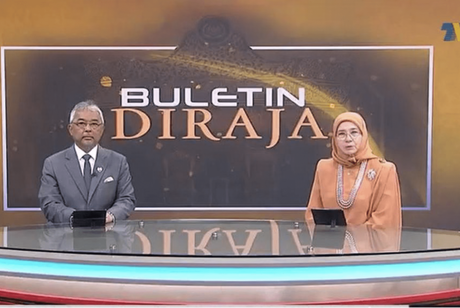 Malaysia's King and Queen shine as TV news anchors